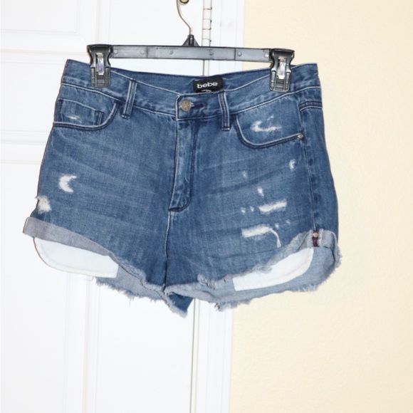 bebe | Shorts | Bebe Ripped Denim Shorts With Pockets Showing | Poshmark